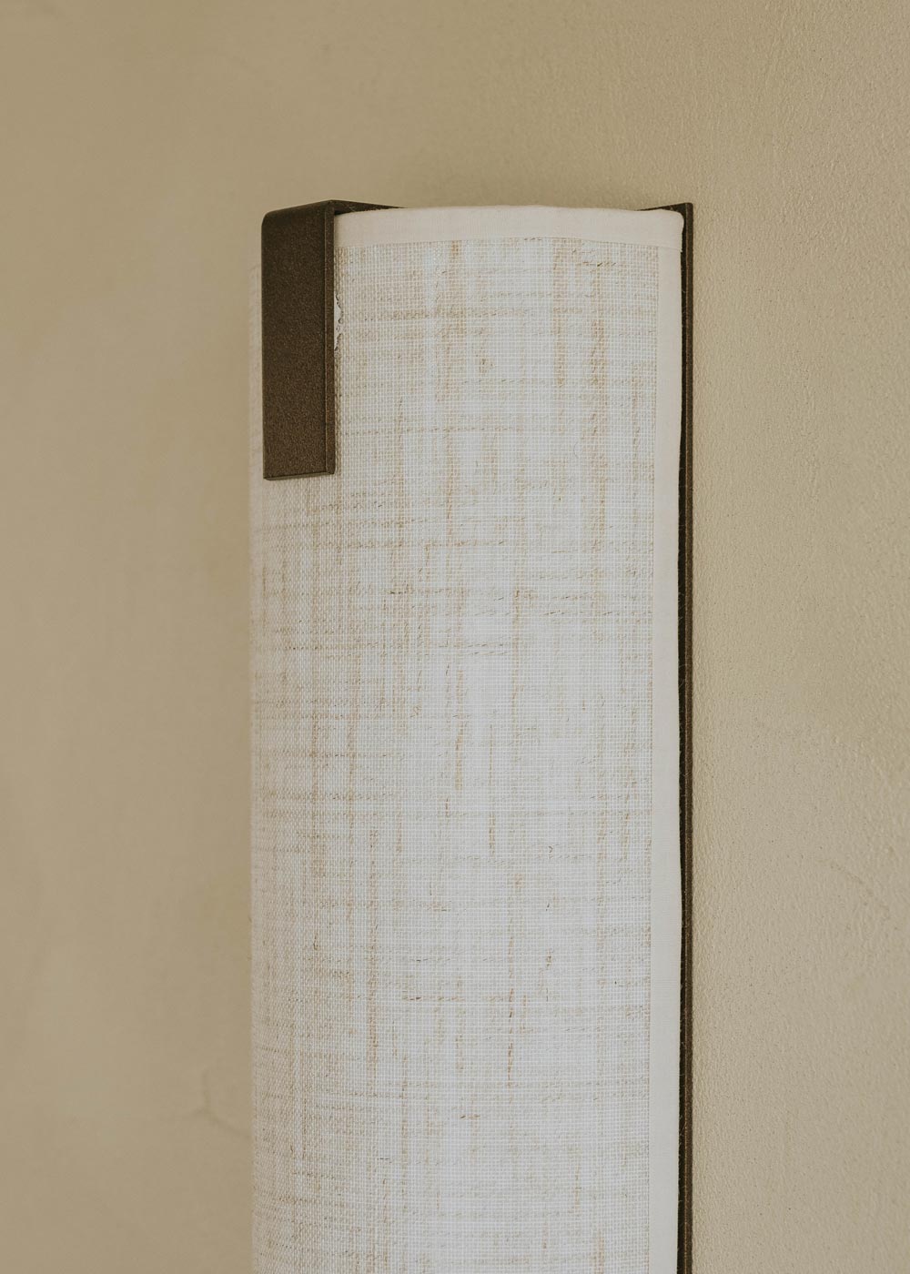 Wall lamp with linen shade by MRGO Arquitectos | Canica